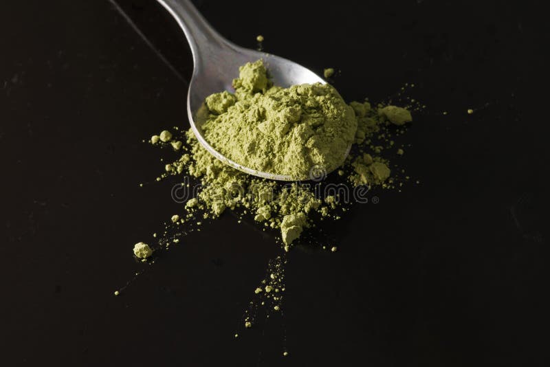 Green Tea Matcha in a Spoon on a Dark Surface. Close Up Shot Stock ...