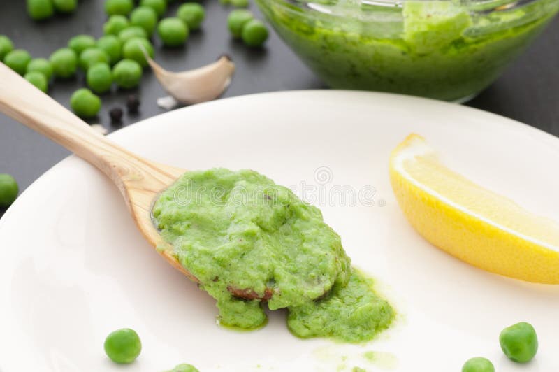 A Spoon Pea Puree stock photo. Image of pureed, paste - 29085792