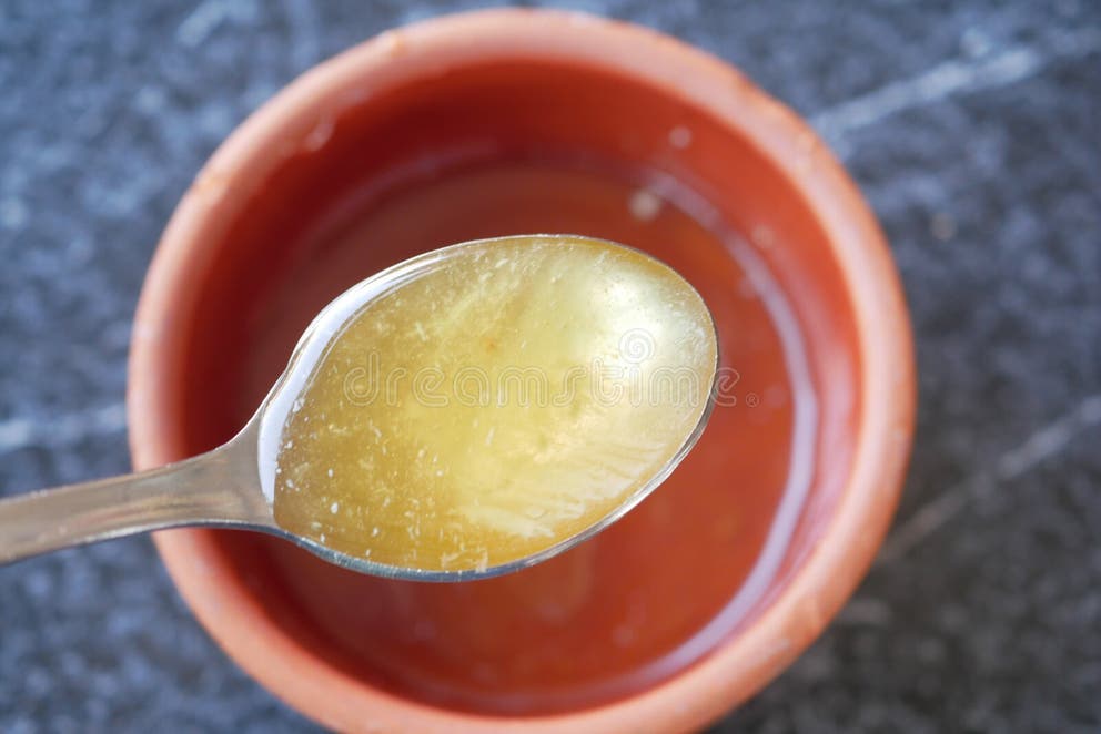 Spoon Pick Honey from Container Stock Photo - Image of pouring ...