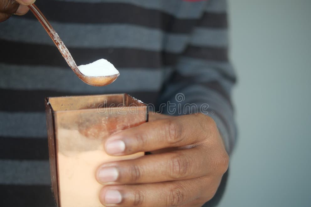 Spoon Pick Salt from a Container Stock Image - Image of salt, seasoning ...
