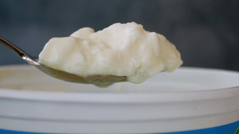Spoon Pick Yogurt from a Container Stock Footage - Video of culinary ...