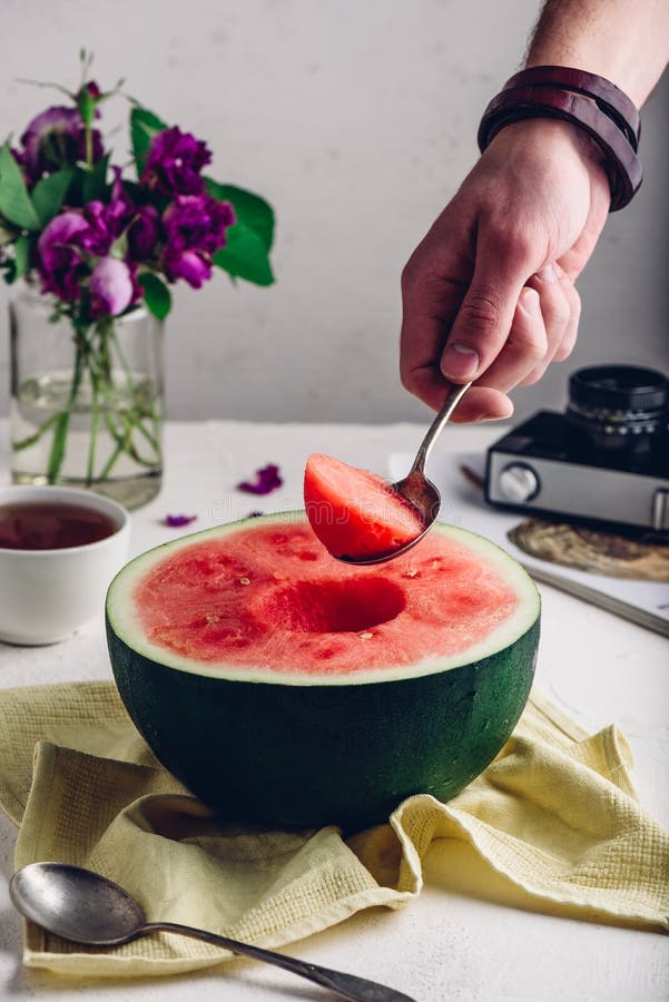 The Spoon with Piece of Watermelon in Hand Stock Image - Image of ...