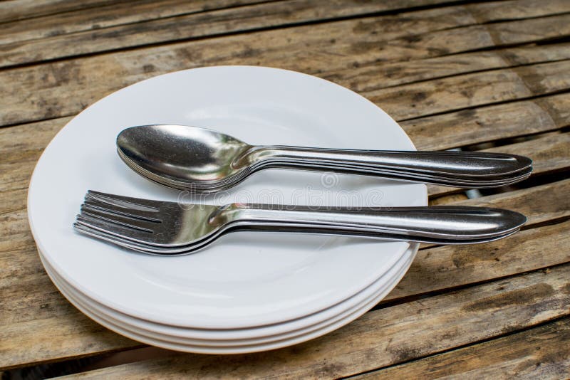 Spoon Plate and Spoon on Dining Table Stock Photo - Image of dining ...
