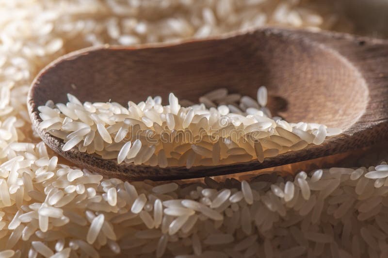 Spoon with rice seeds stock image. Image of natural - 121867907
