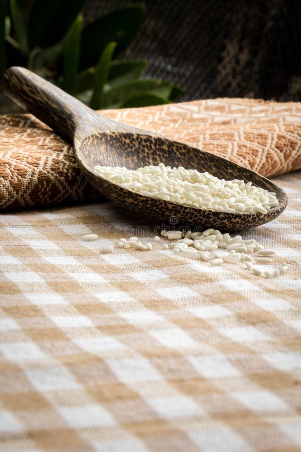 Spoon Rice on the Table Covered with Cotton. Stock Photo - Image of ...