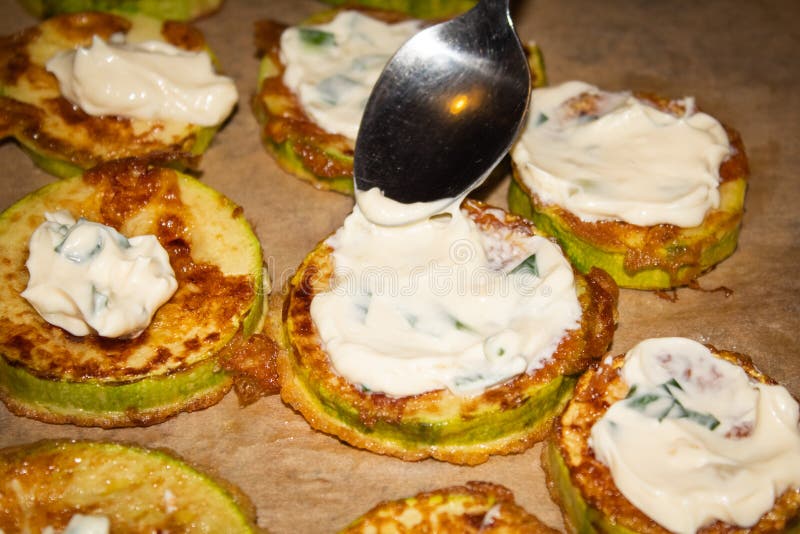 Spoon Smear Mayonnaise Sauce on Fried Courgettes for Baking Stock Photo ...