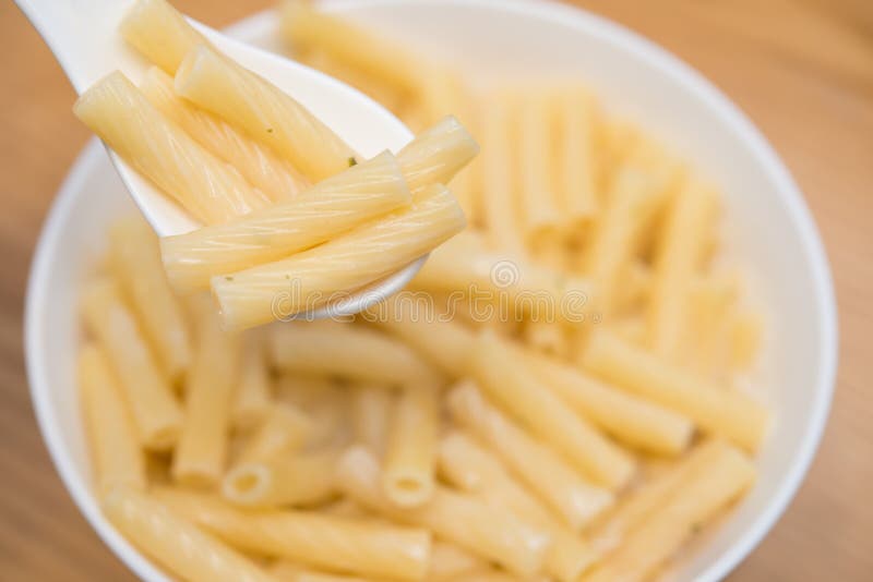 Spoon Taking Out Fresh Italian Pasta with Cheese Sauce Stock Image ...