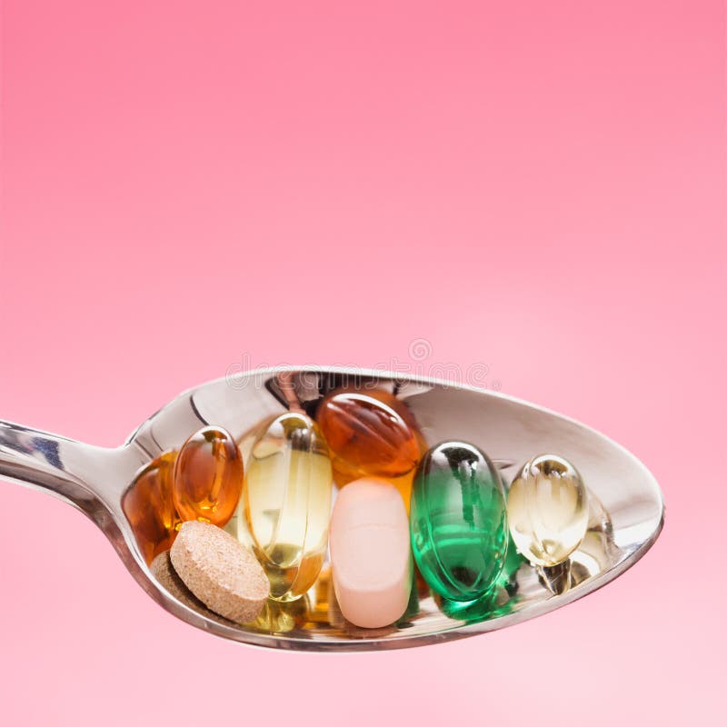 Spoonful of Pills. Isolated Stock Image - Image of drugs, indoors: 12985277