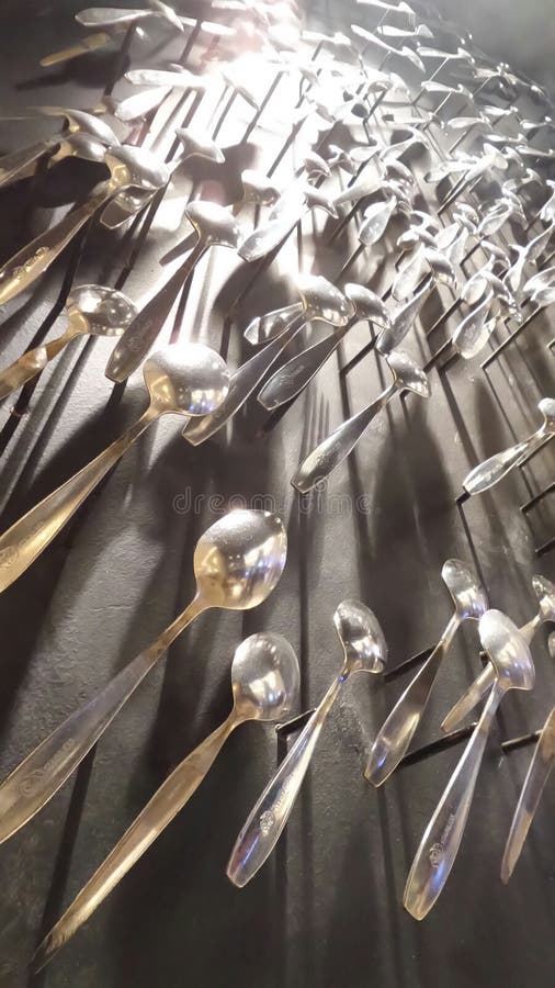 Spoons decoration on wall editorial image. Image of wall - 49297300