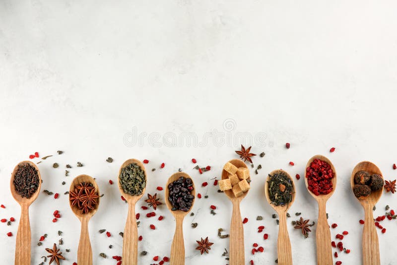 Spoons with Different Types of Tea on Light Background Stock Photo ...