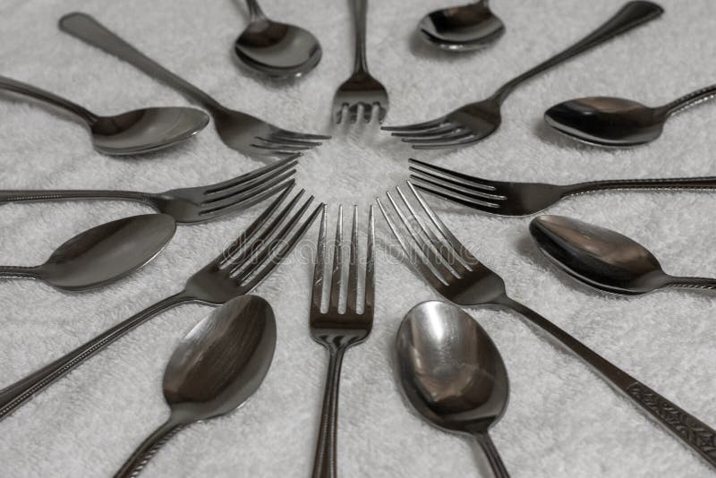 Spoons and forks stock photo. Image of silver, pattern - 134338052