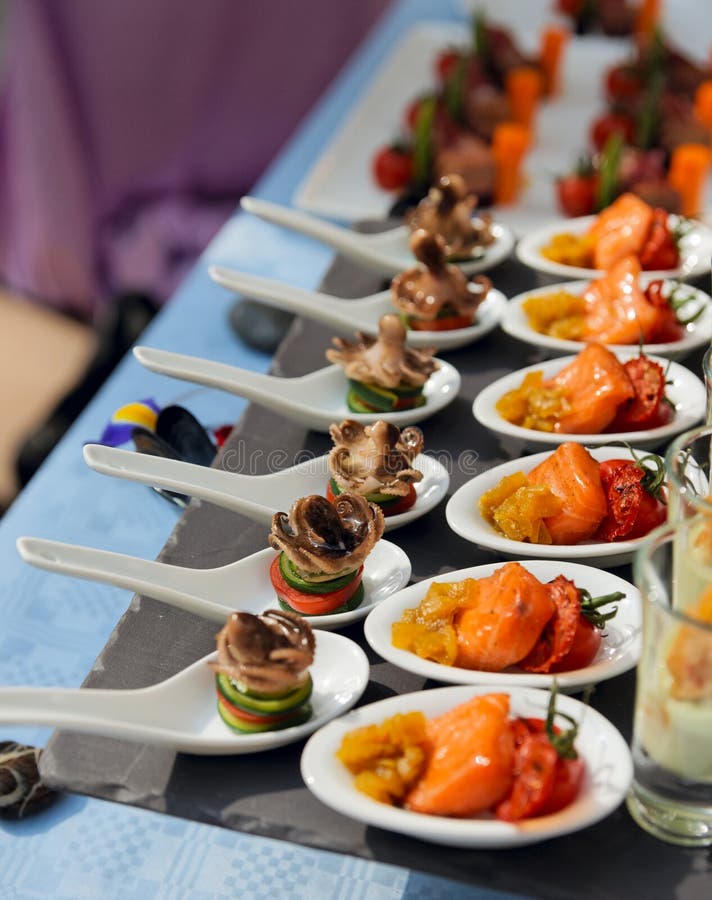 Spoons with seafood snacks stock image. Image of service - 25127849