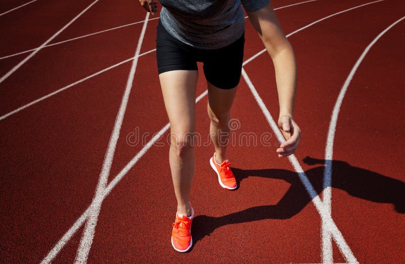 Sport Backgrounds. Sprinter Starting on the Running Track. Dramatic ...