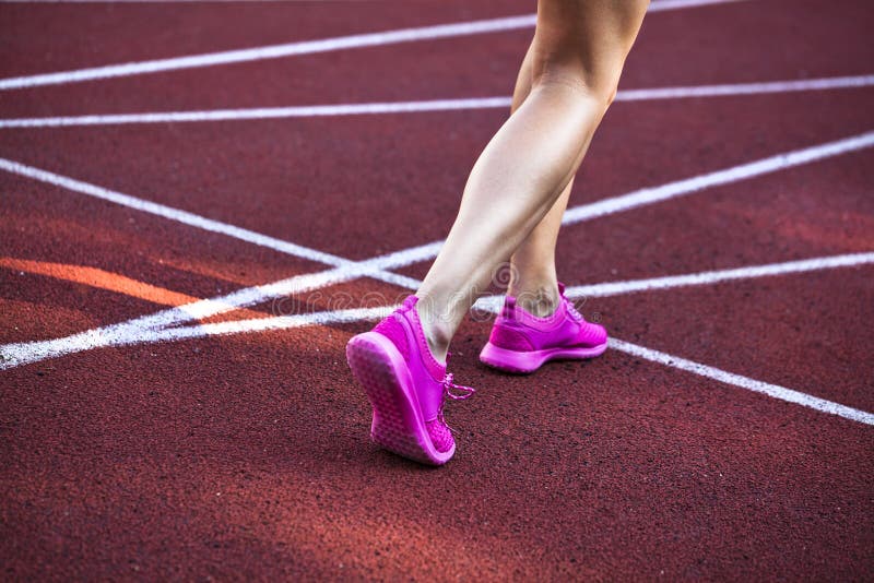 Sport Backgrounds. Sprinter Starting on the Running Track. Dramatic ...