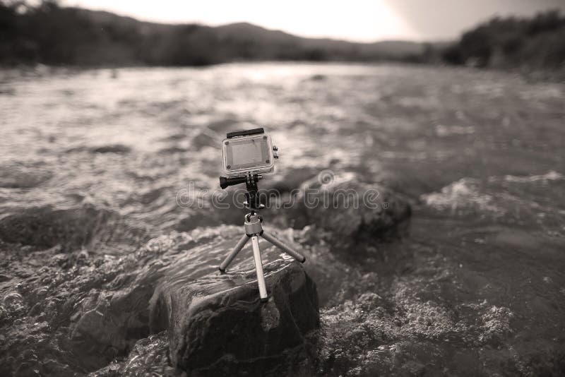Sport camera on a tripod stock image. Image of high, river - 77340407