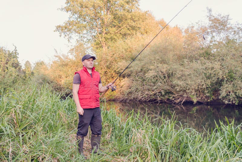 Sport fishing on the river stock photo. Image of lure - 244052260