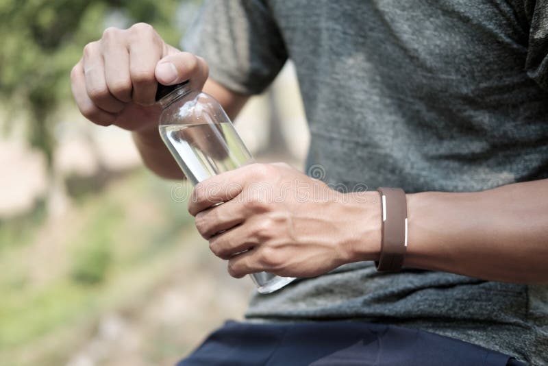 Sport Man and Pure Water. Sport Man Open Water Bottle. Stock Image ...