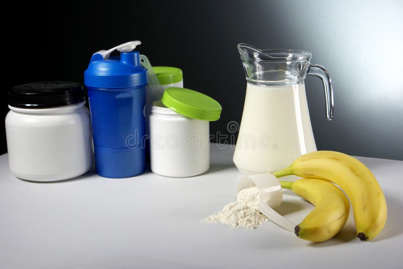 Sport Nutrition Supplement Containers with Jug of Milk Stock Image ...