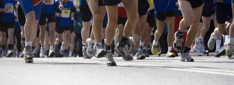 Runners To Race To the Finish Line of the Marathon Stock Photo - Image ...