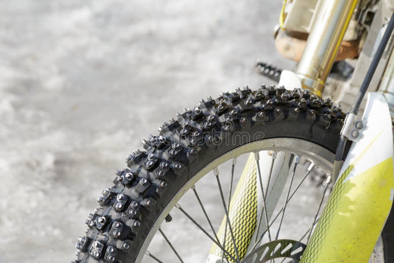 The Wheel From A Motorcycle With Spikes Stock Image - Image of winter ...