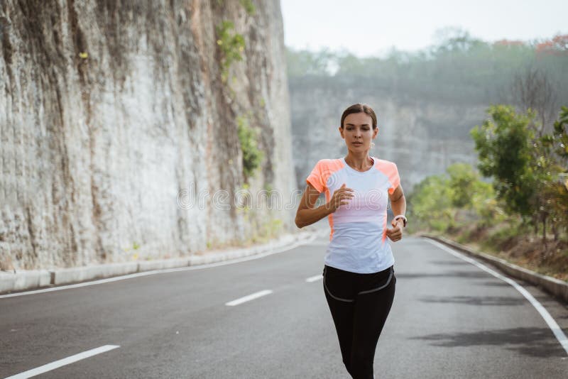 Sport Woman Running on Sideroad Stock Image - Image of road, fashion ...