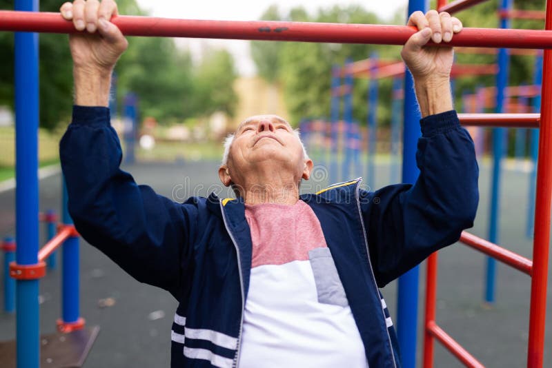 Sportive Old Man Doing Pull-ups Outdoors Stock Photo - Image of fitness ...