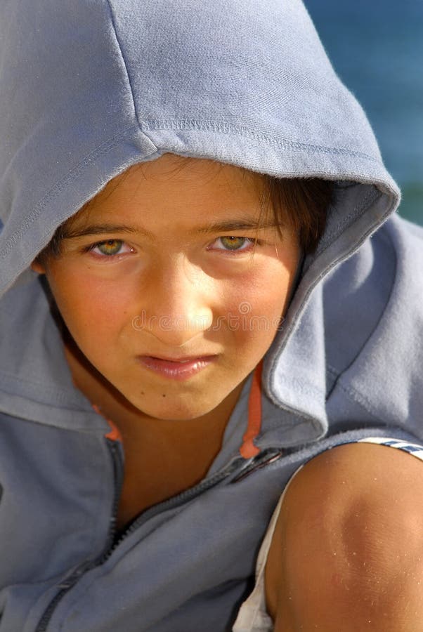 Boy Furtive Look stock image. Image of portrait, outdoors - 357695