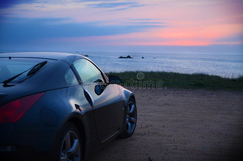 Sports car Sunset stock photo. Image of cold, ocean, blue - 20903860