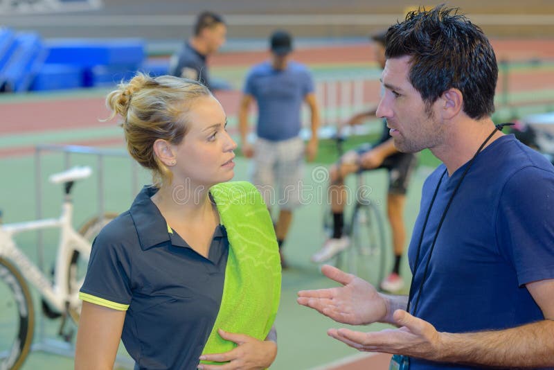 Sports Coach Questioning Athlete Stock Photo - Image of circuit ...