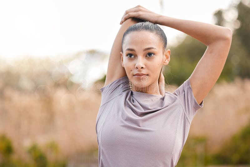 Sports Fitness And Woman Stretching Arms In Nature To Get Ready For