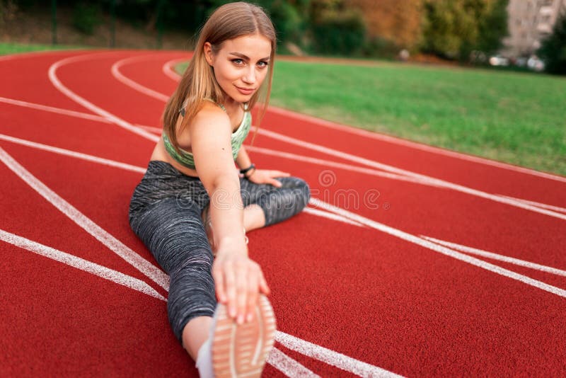 Sports Girl Doing Stretching before Running. Stock Photo - Image of ...