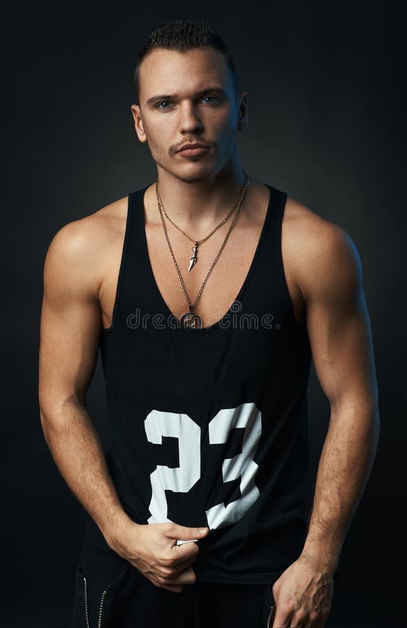 Sports Guy on a Black Background Stock Photo - Image of open, bronzed ...