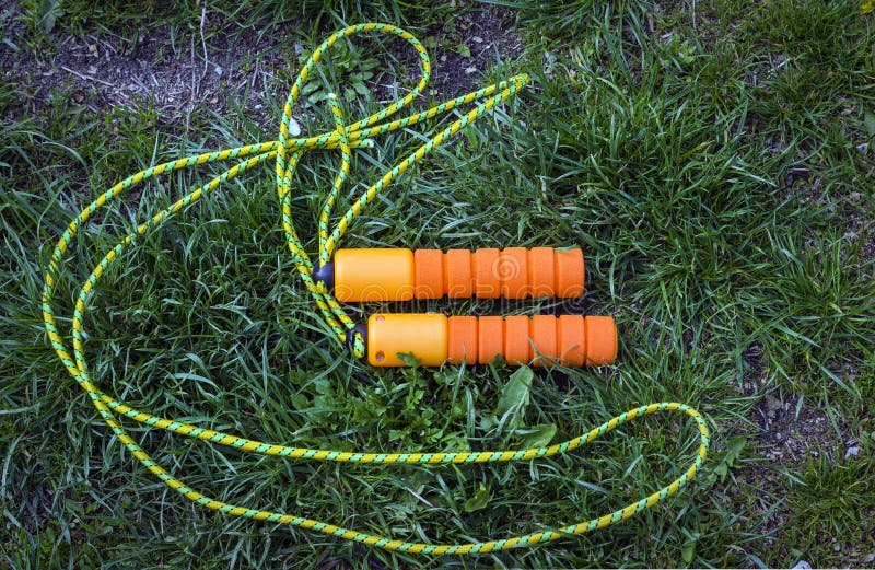 Sports Jump Rope on the Grass Stock Photo - Image of lifestyle, green ...