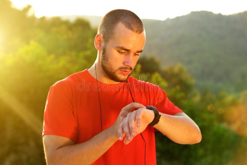 Sports Man Checking Time on Watch after Workout Stock Image - Image of ...