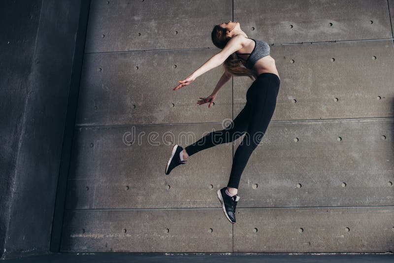 Sports Young Woman Doing Back Bend Jump Stock Image - Image of slim ...