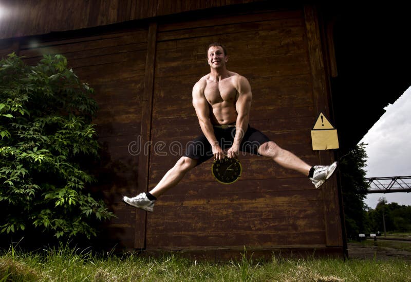 Sportsman and clock stock photo. Image of beauty, exercise - 83381332