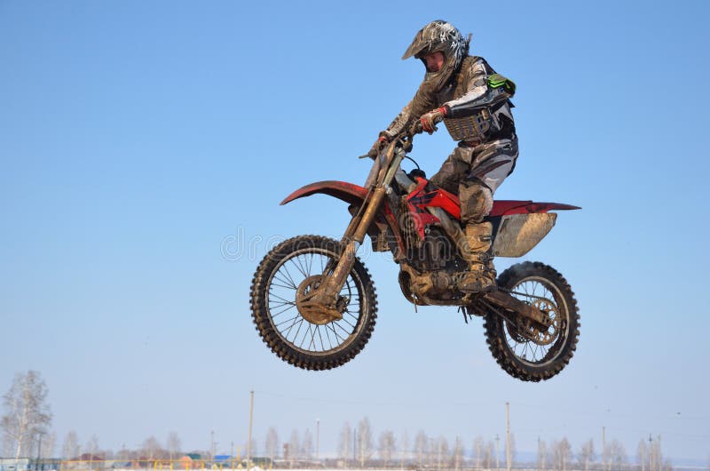 Sportsman on the Motorcycle Flies through the Air Stock Image - Image ...