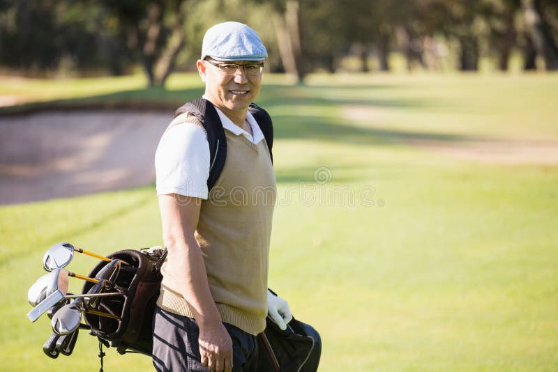 Sportsman Posing with His Golf Bag Stock Photo - Image of clear, player ...