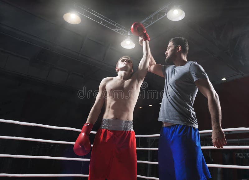 Fighting in boxing ring stock image. Image of people - 80672869