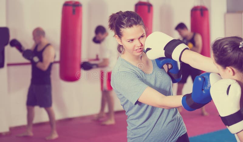 Having Sparring with Each Other on the Boxing Ring. Young Tattooed ...