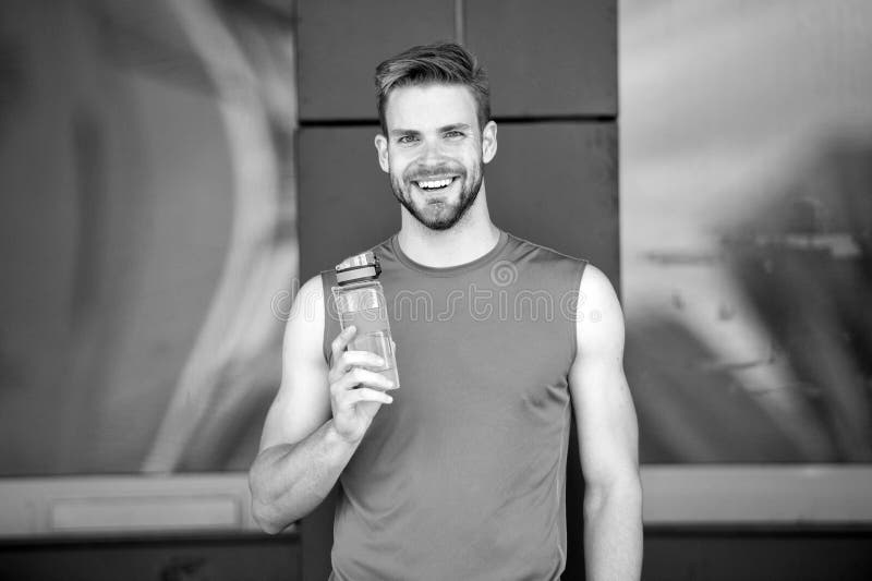Sporty Accessory. Man Athlete Hold Special Sporty Bottle Care Hydration ... Sporty Accessory. Man Athlete Hold Special Sporty Bottle Care Hydration ...