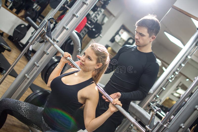 Sporty Couple Workout Together in Gym. Stock Photo - Image of adult ...