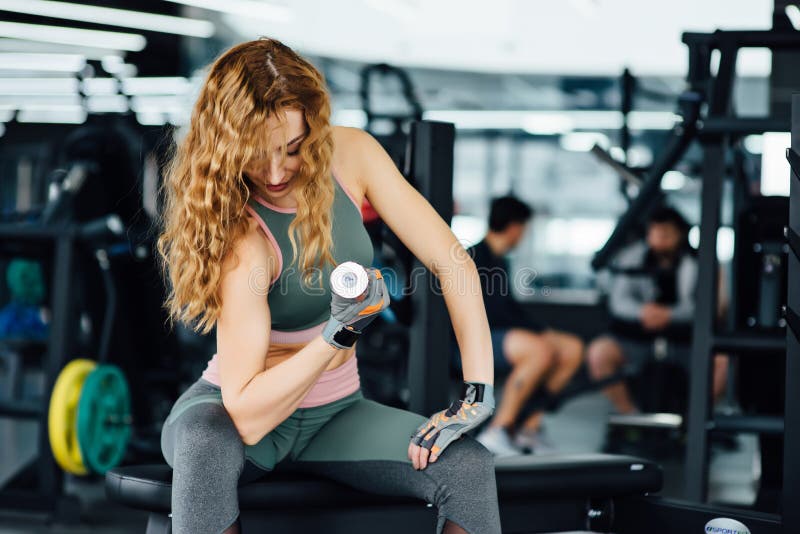 Sporty Girl Doing Exercise with Dumbbells. Stock Photo - Image of care ...