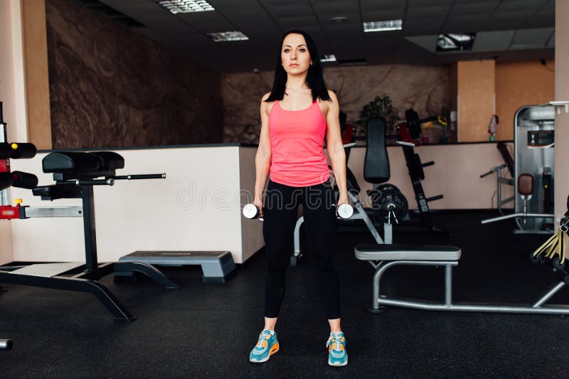 Sporty Girl Doing Exercise with Dumbbells. Stock Image - Image of ...