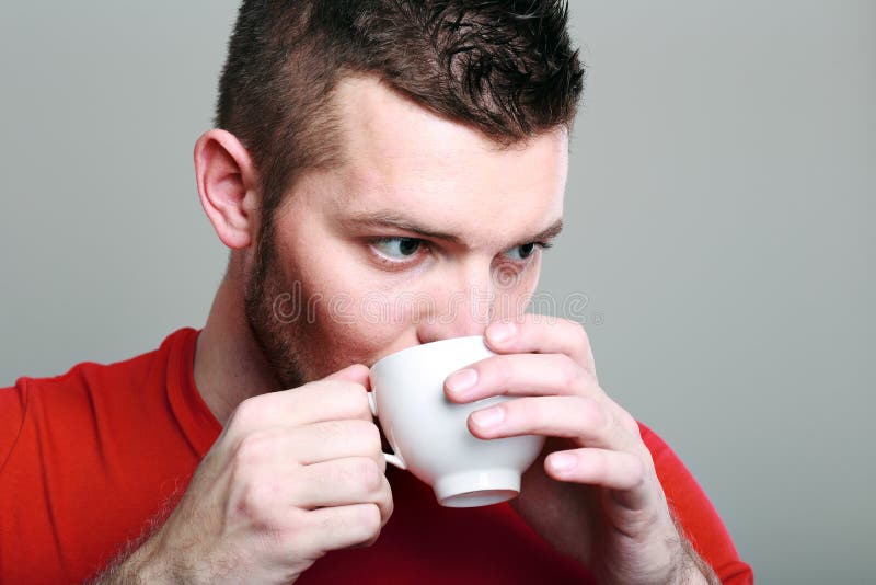 Sporty guy drinking coffee stock photo. Image of modern - 50063310