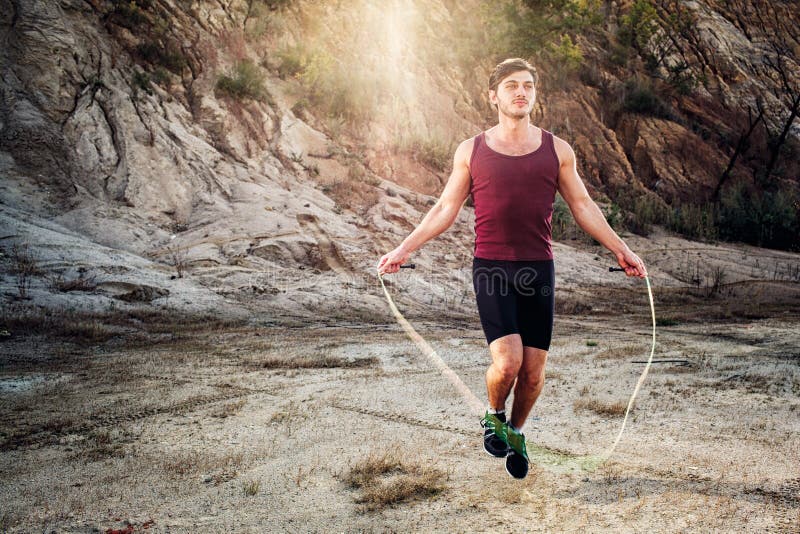 Sporty Man Jumping Rope Outdoors Stock Photo - Image of exercise ...