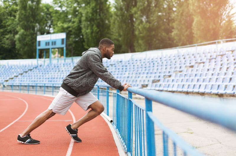 Sporty man warming up. stock image. Image of sportswear - 137413111