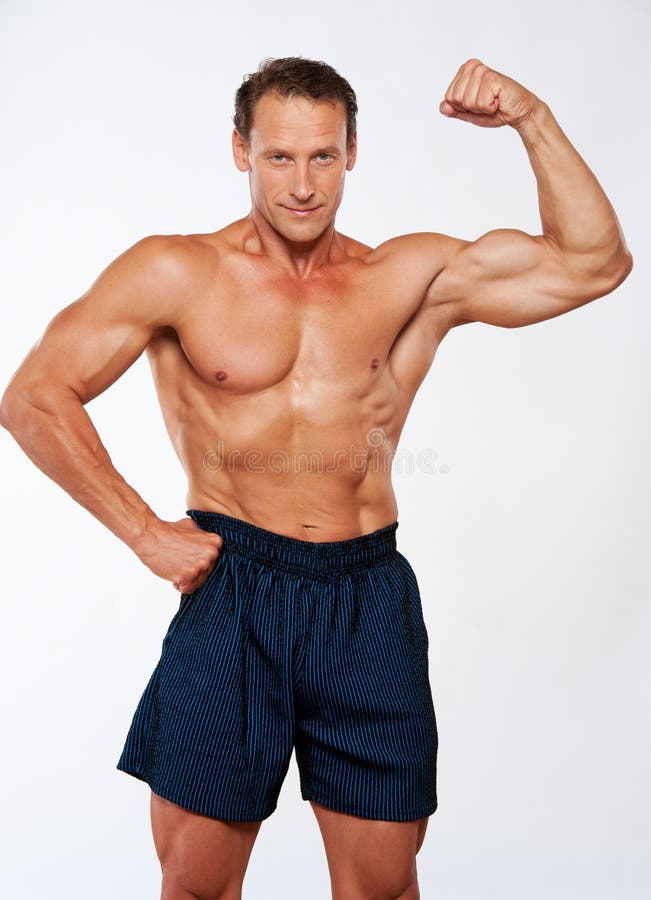 Sporty Muscle Man in Shorts Stock Photo - Image of abdominals, muscle ...