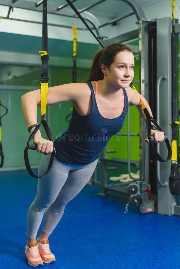 Sporty Young Woman Doing Exercise at the Gym Stock Photo - Image of ...