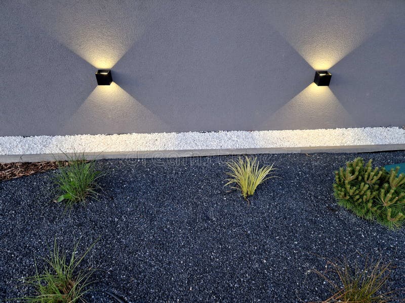 The Spot Wall Light Illuminates the Wall of the Facade of the House in ...